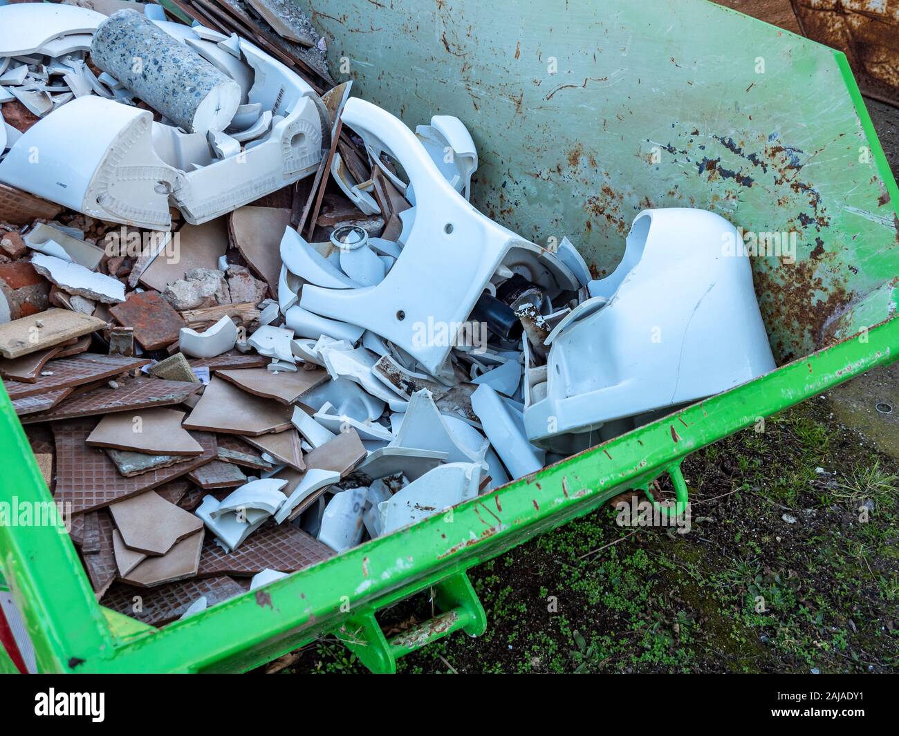 Containers of rubble from a house building Stock Photo - Alamy