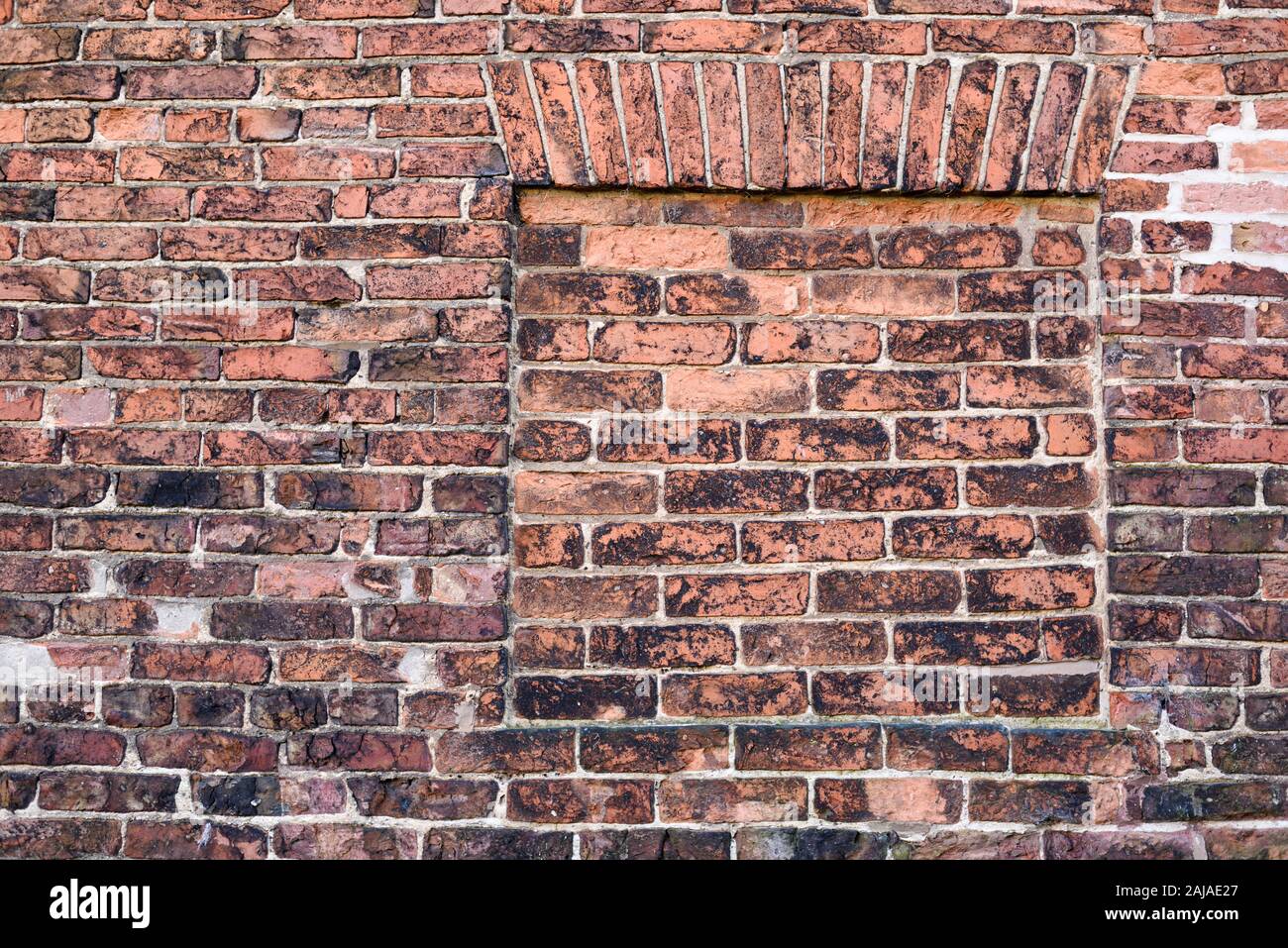 Grunge Looking Brick Work with bricked in window on the side of a ...