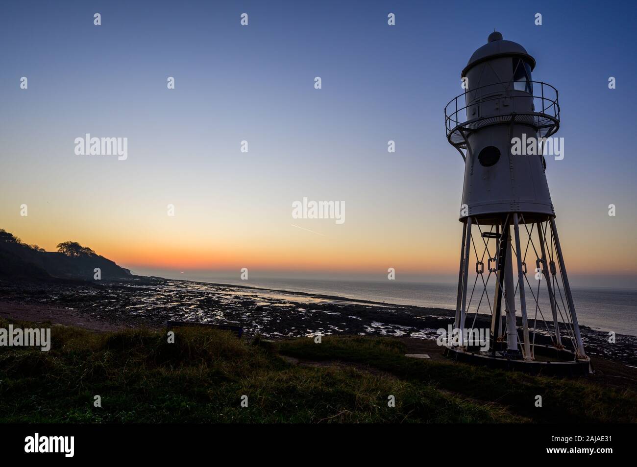 Sunset at Black Nore Lighthouse at Portishead, Somerset, England Stock ...