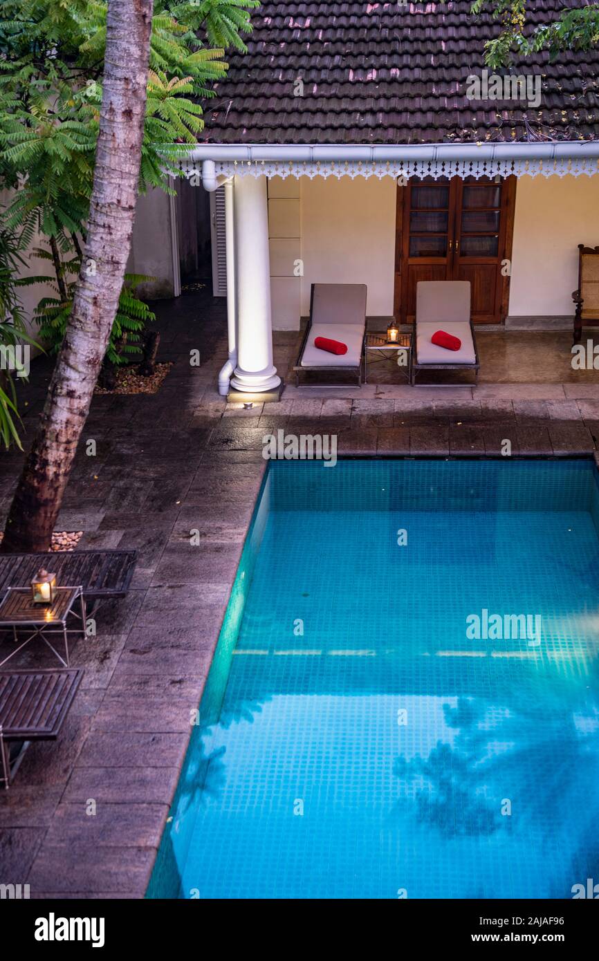 swimming pool in the court yard of a colonial style boutique hotel ...