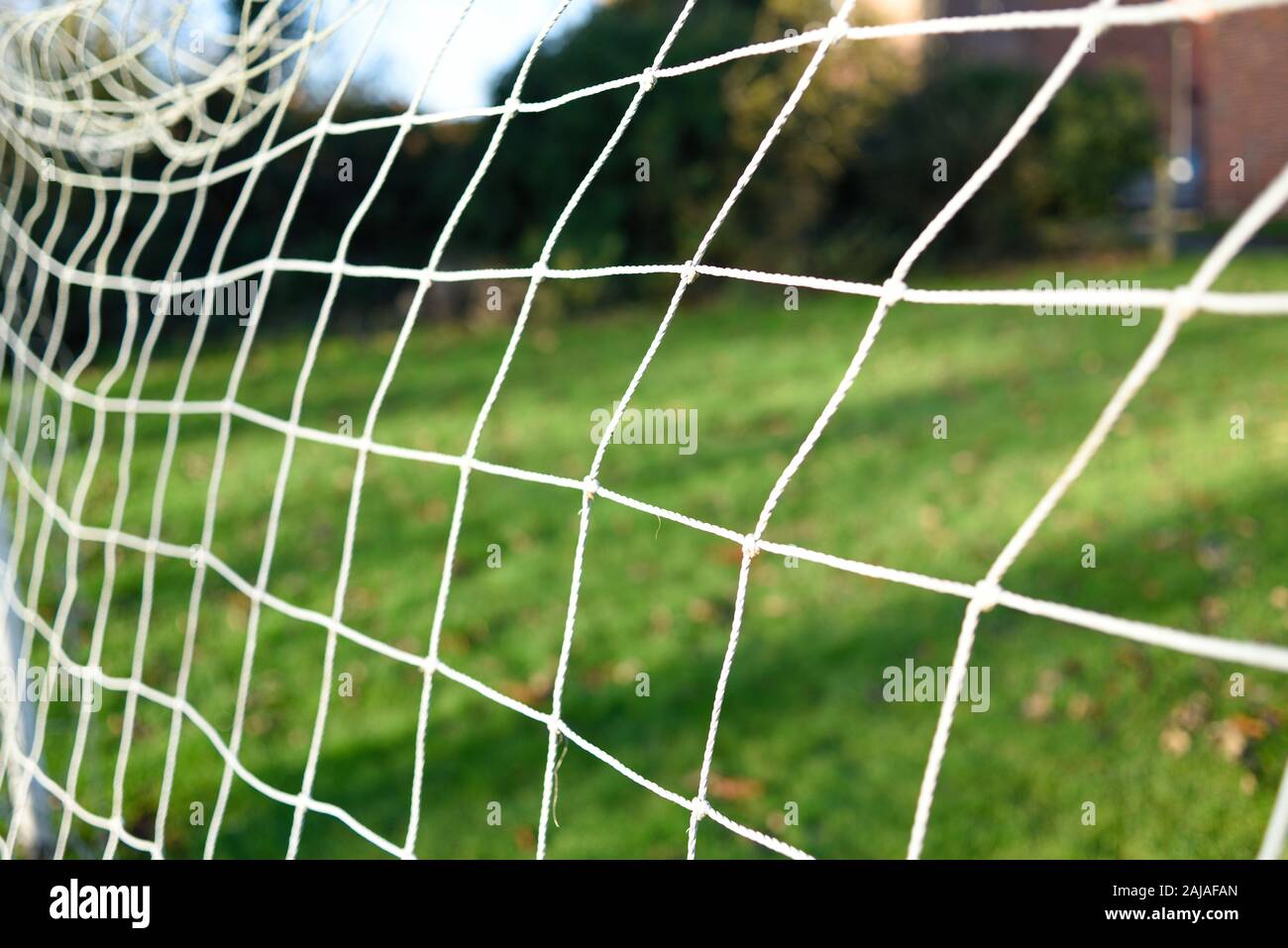 Football in goal nets hi-res stock photography and images - Alamy