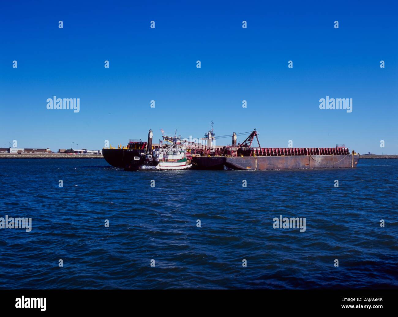 Tug boat floating crane hi-res stock photography and images - Alamy