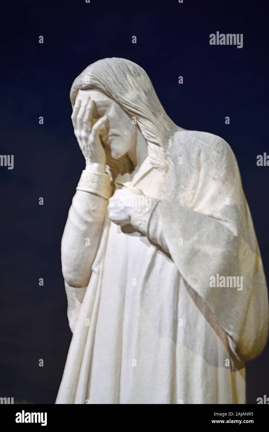 Crying virgin mary statue hi-res stock photography and images - Alamy