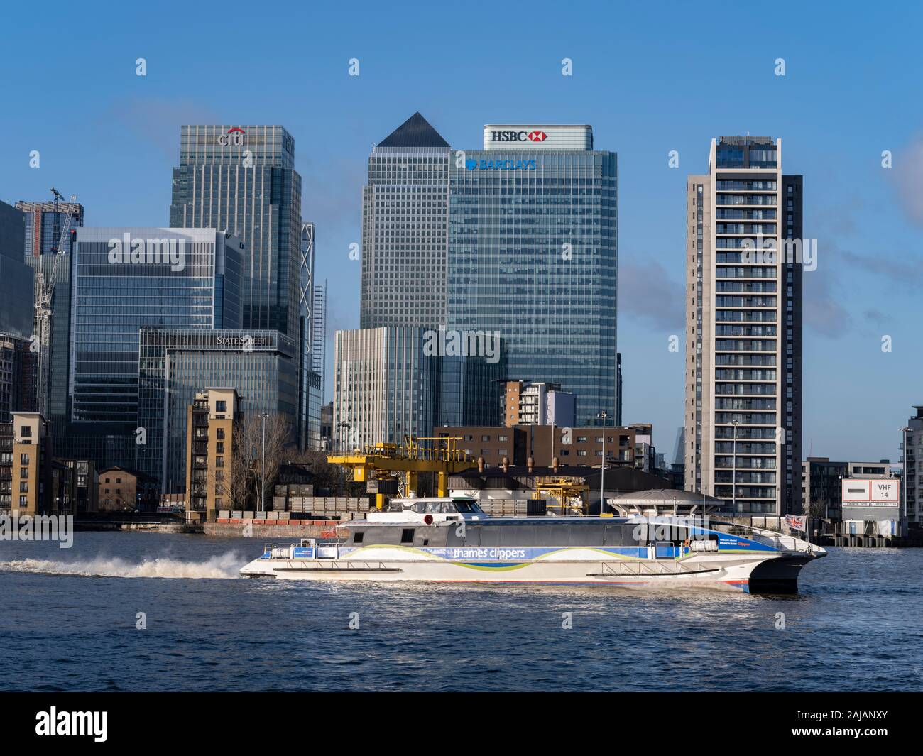 Thames Clipper Ferry in foreground with Canary Wharf London Financial ...