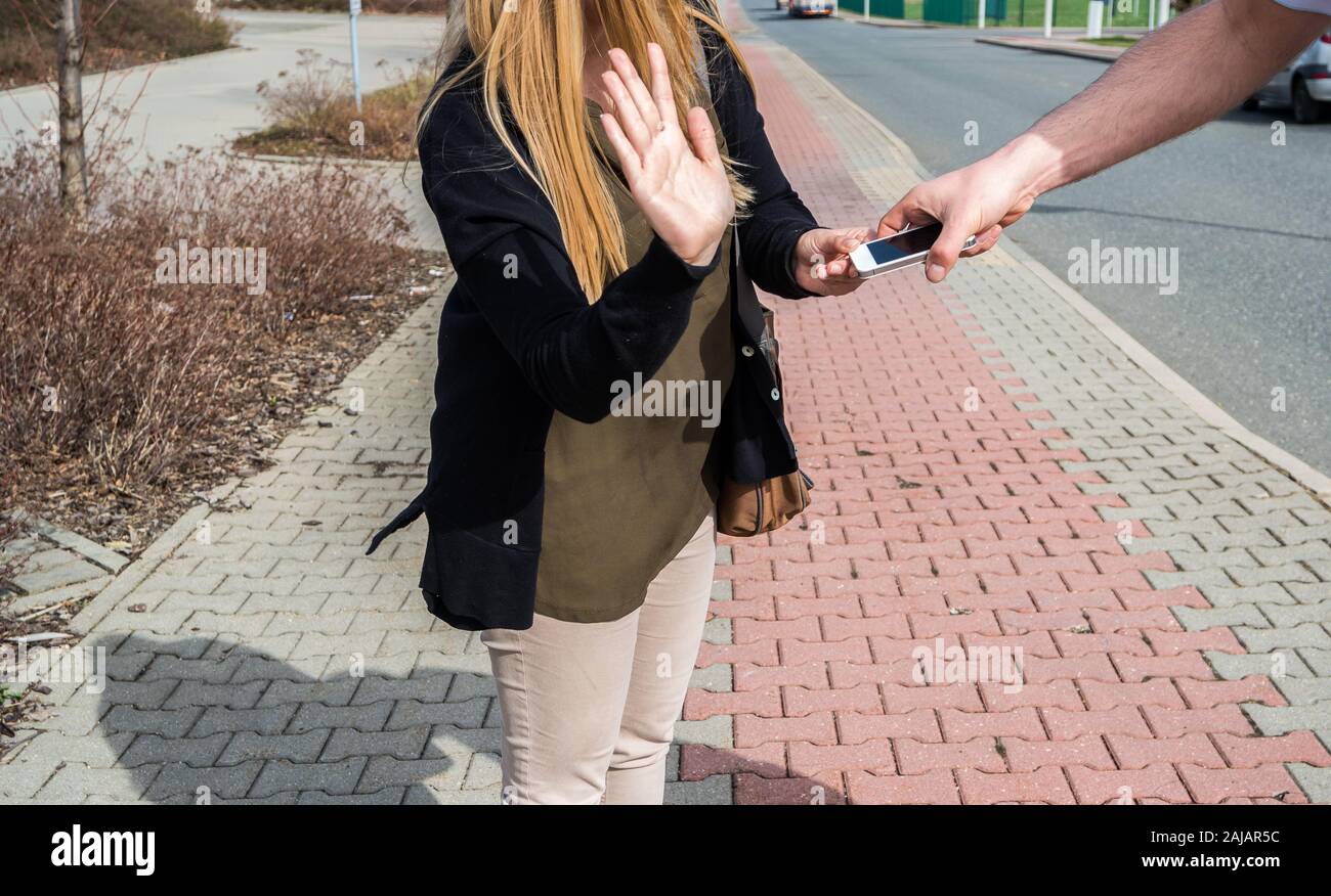 Hand pickpocket hi-res stock photography and images - Alamy