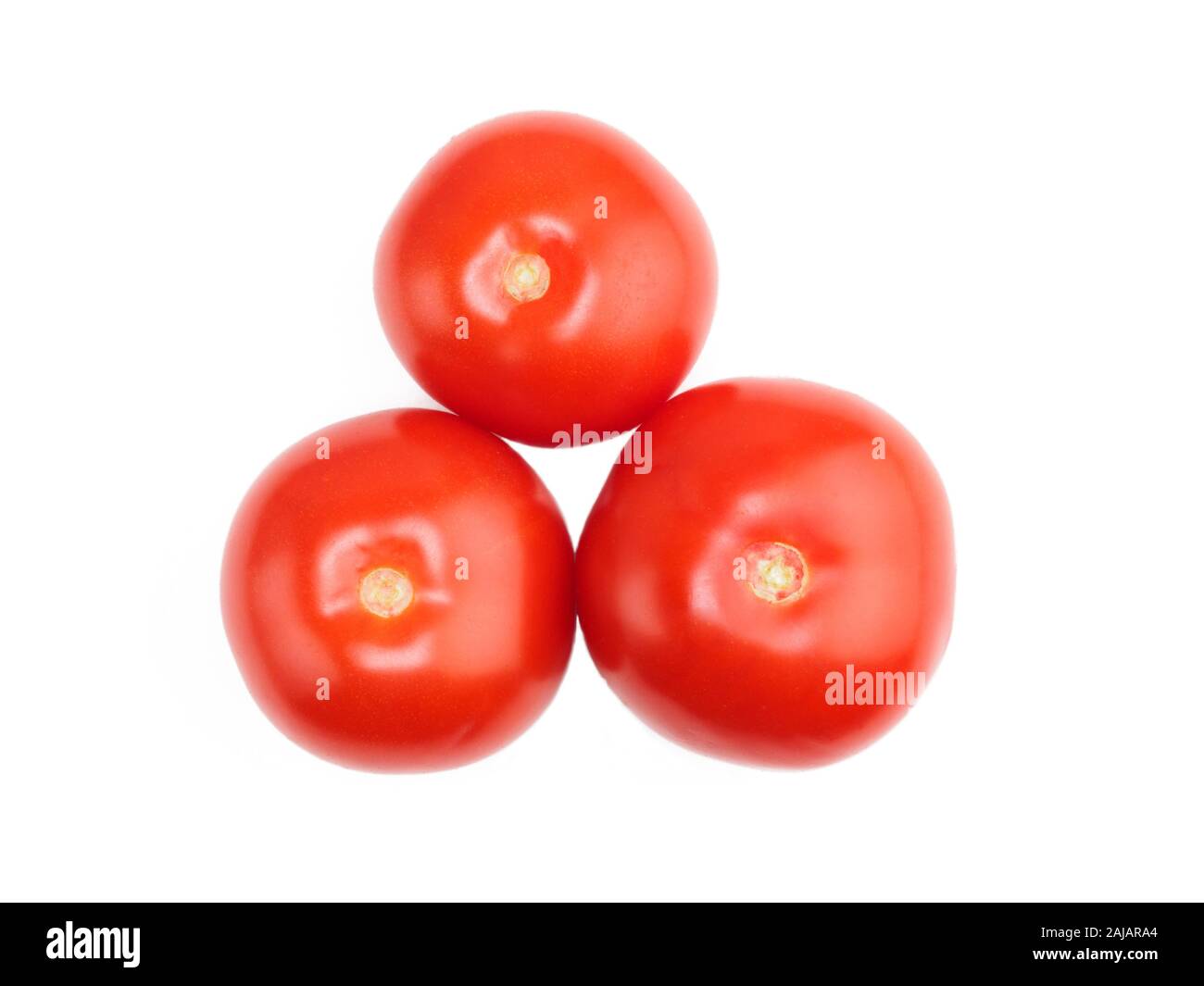 Three red tomatoes on white isolated background. Healthy eating concept ...
