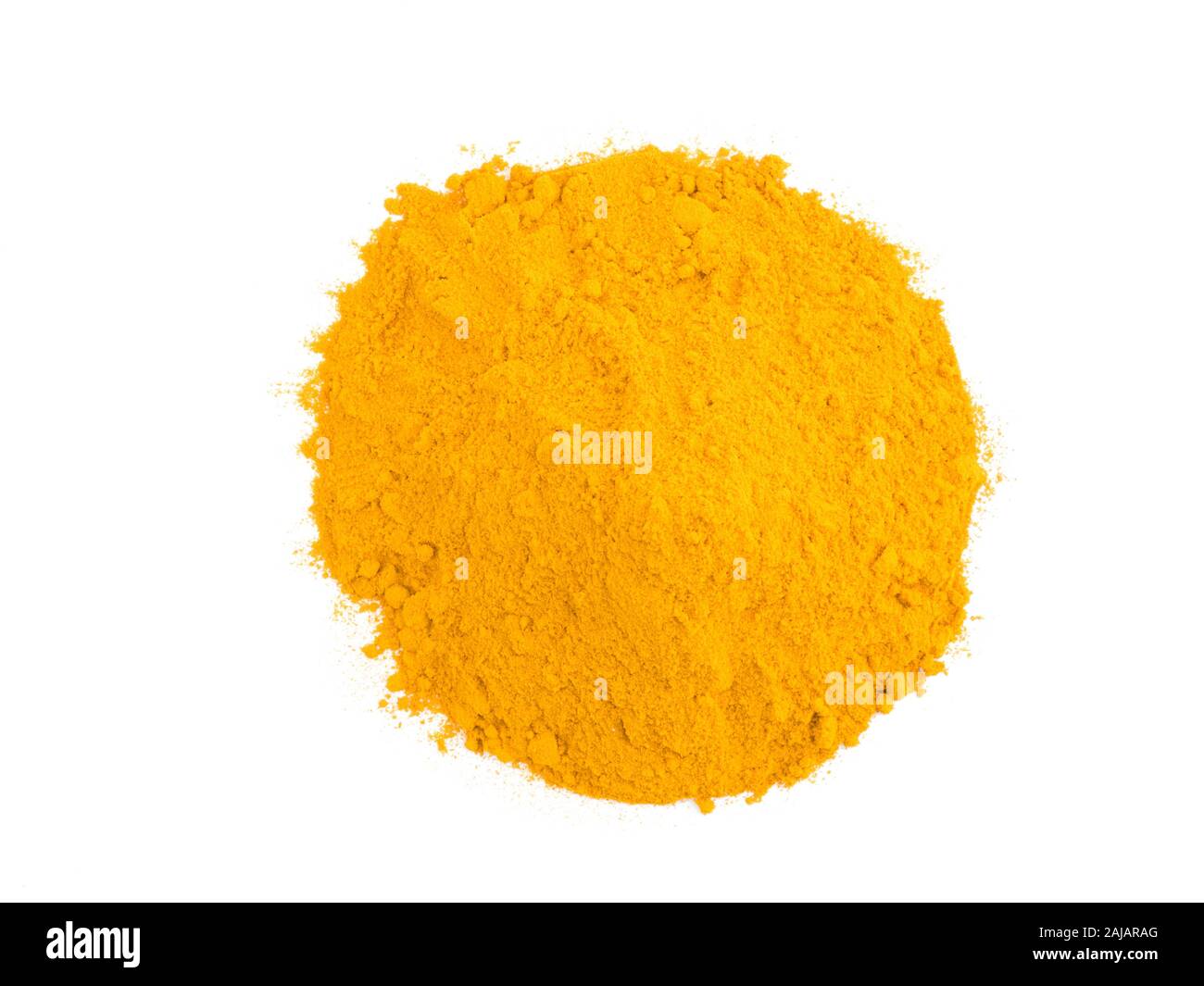 A round bunch of turmeric powder on white isolated background. Indian ...