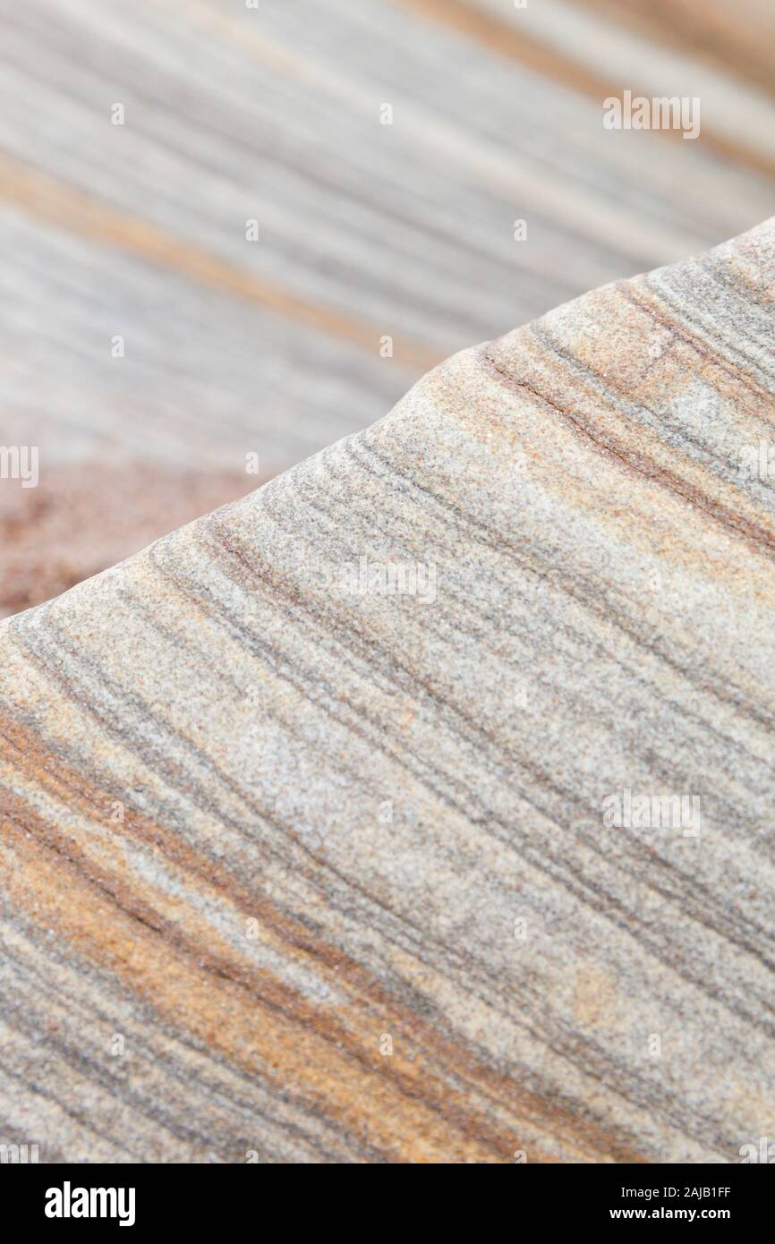 Abstract patterns, shapes and lines in the soft pastel coloured rocks ...