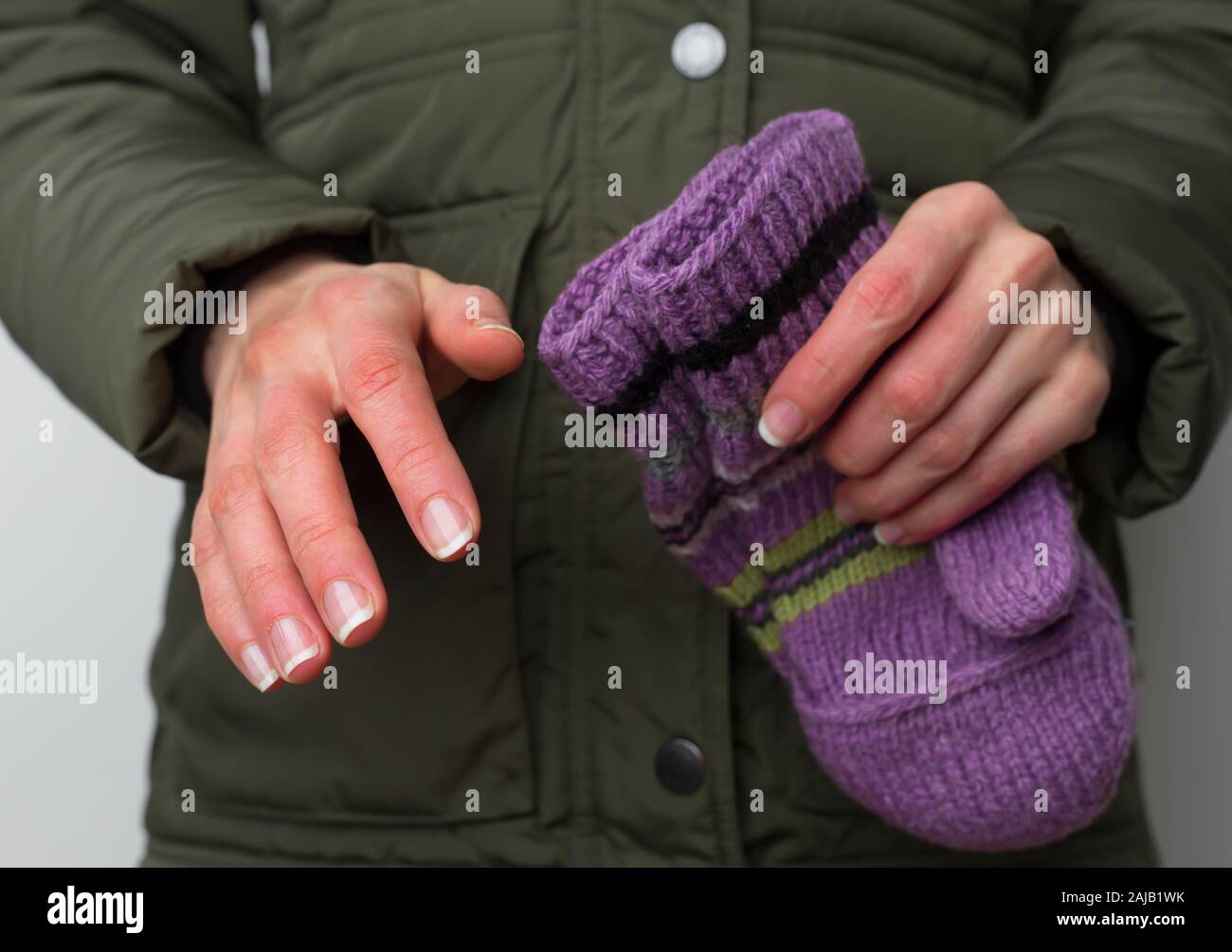 Frozen woman's hands in winter Stock Photo - Alamy