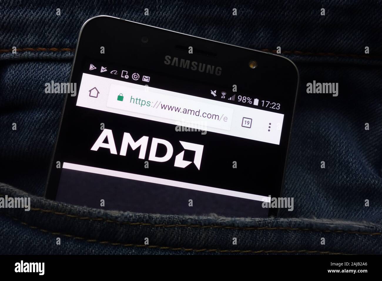 AMD website displayed on Samsung smartphone hidden in jeans pocket ...