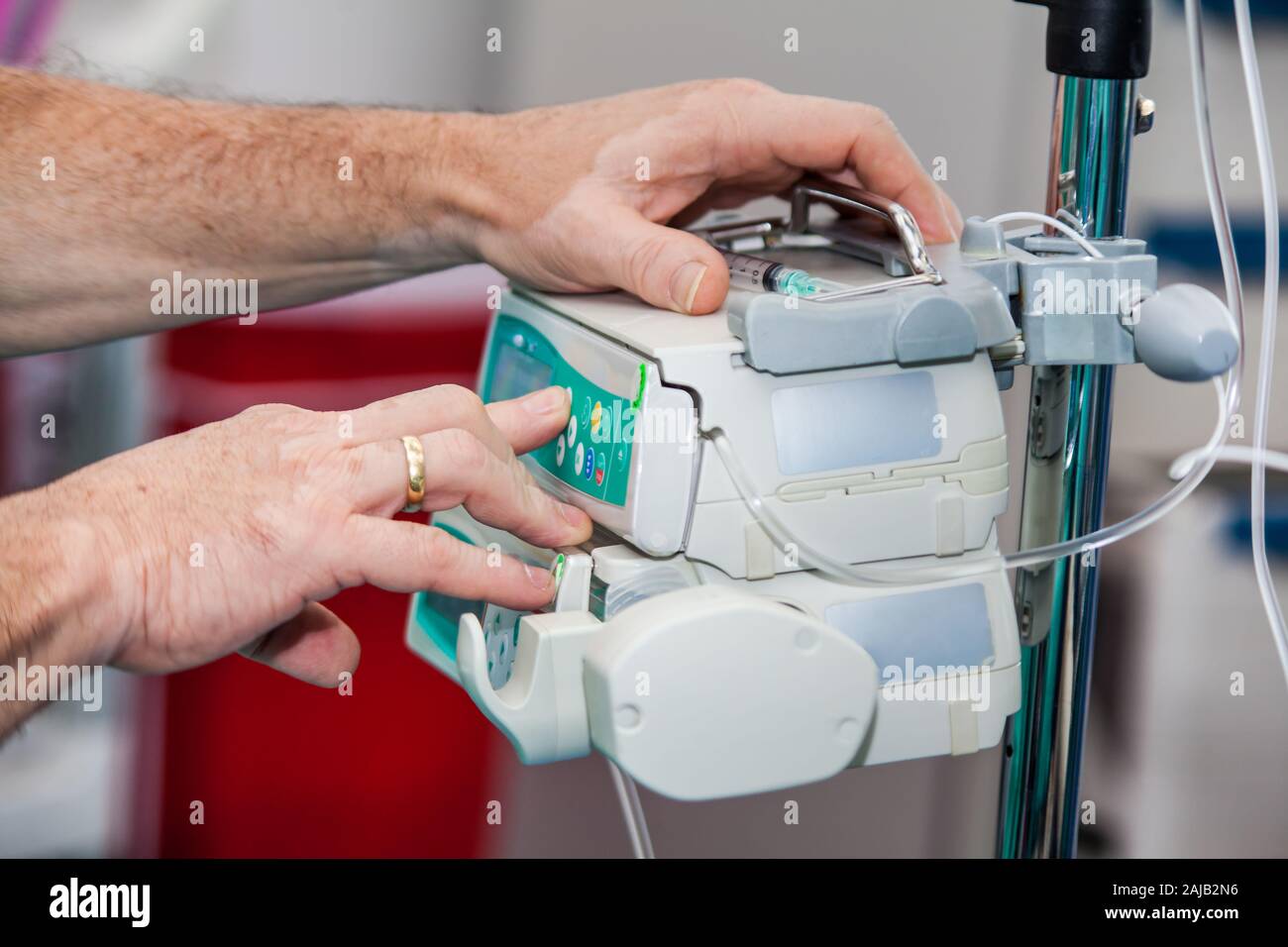 Anesthetist at a operating room setting the anesthesia machine Stock ...