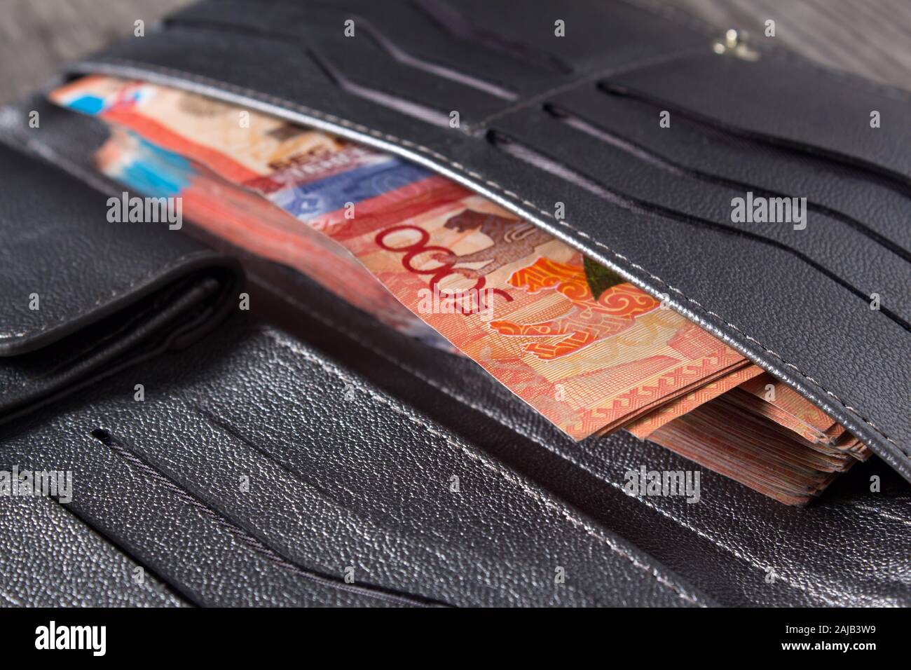 Paper banknotes tenge KZT. Tenge is the national currency of Kazakhstan ...