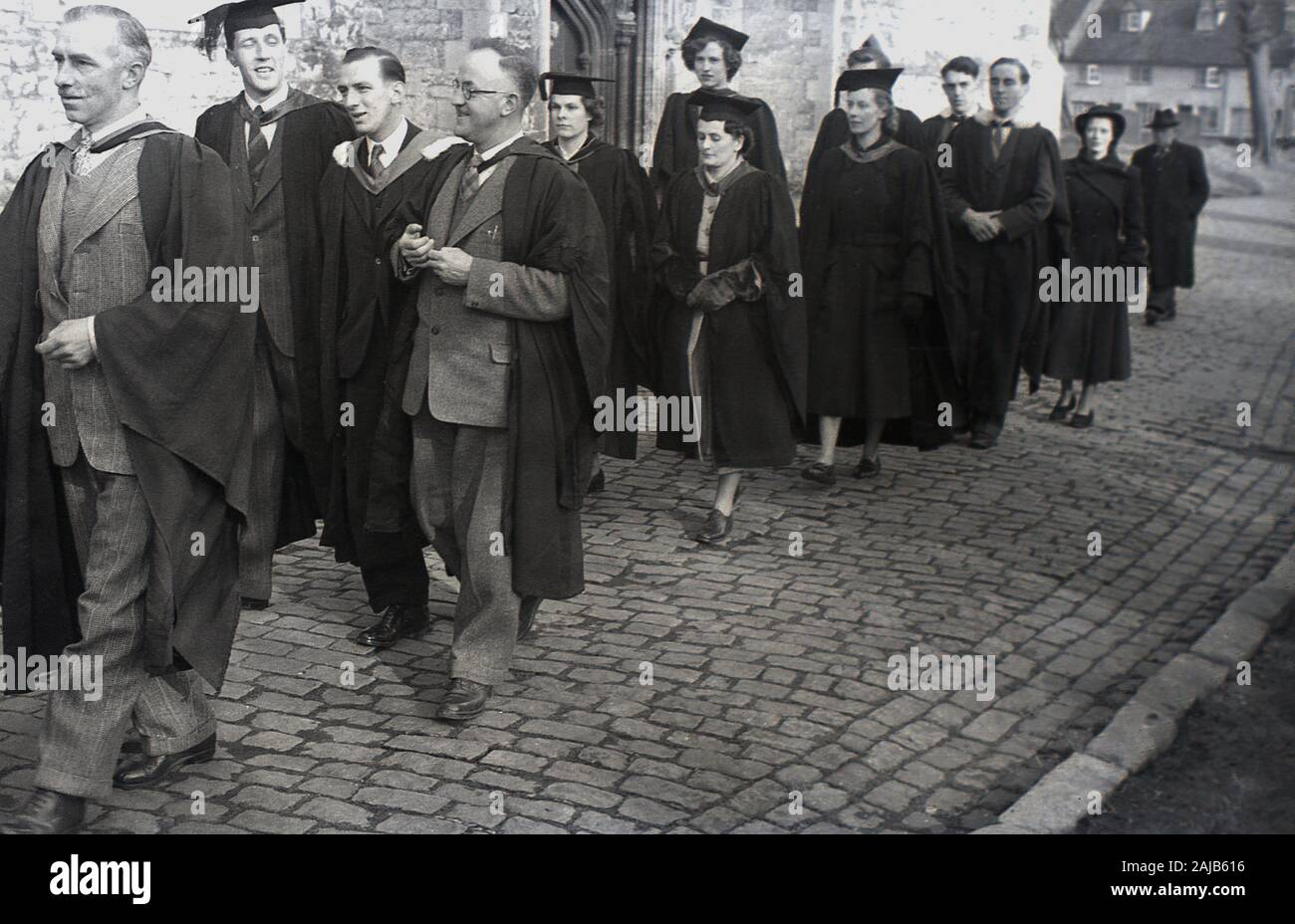 1950s, historical, a group of school teachers wearing academic gowns ...