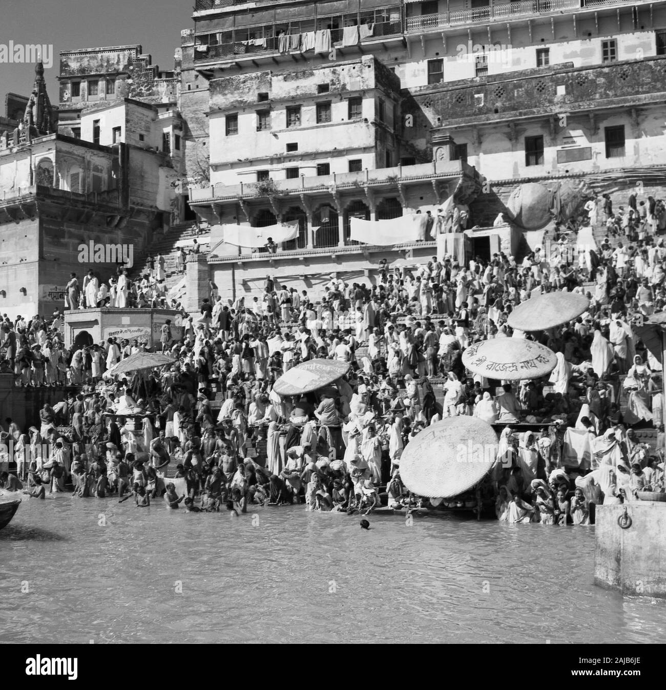 1950s, historical, people gathering and bathing at the banks of the ...