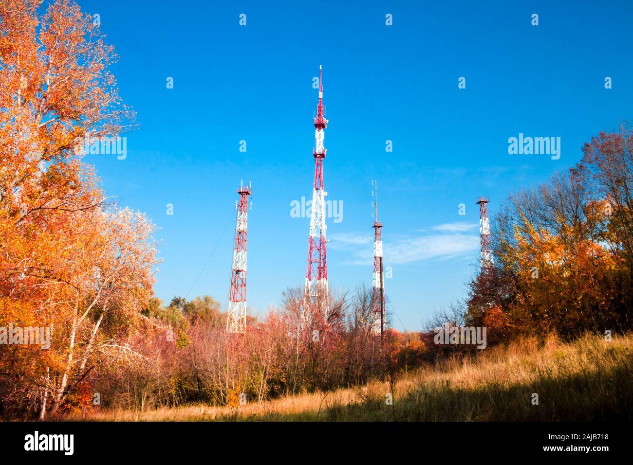 Radar station with towers among colorful autumn nature. Lysa Hora, Kyiv ...