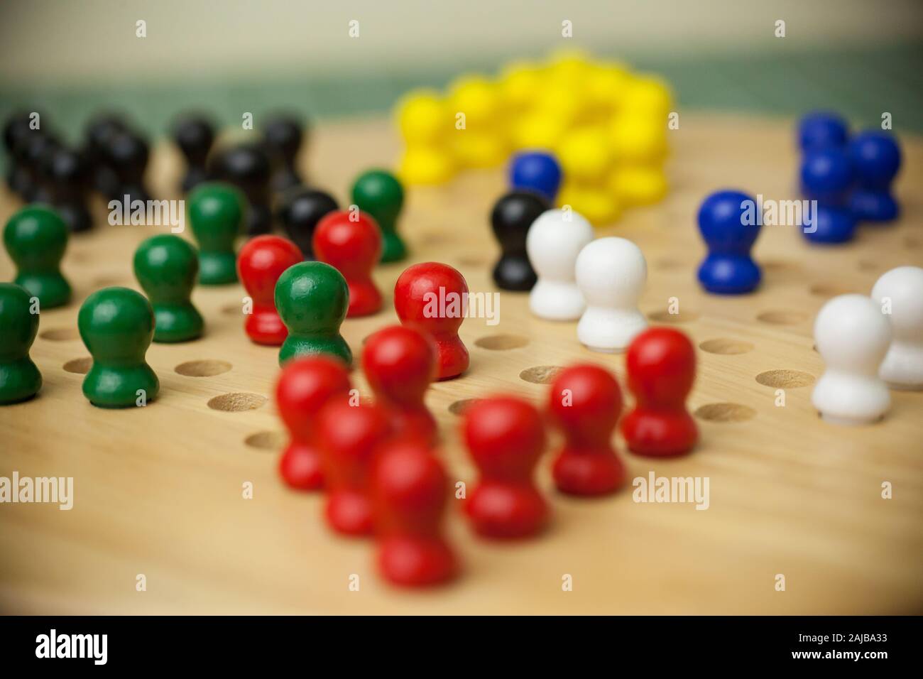 A closeup view of a classic wooden set of Chinese Checkers Stock Photo ...