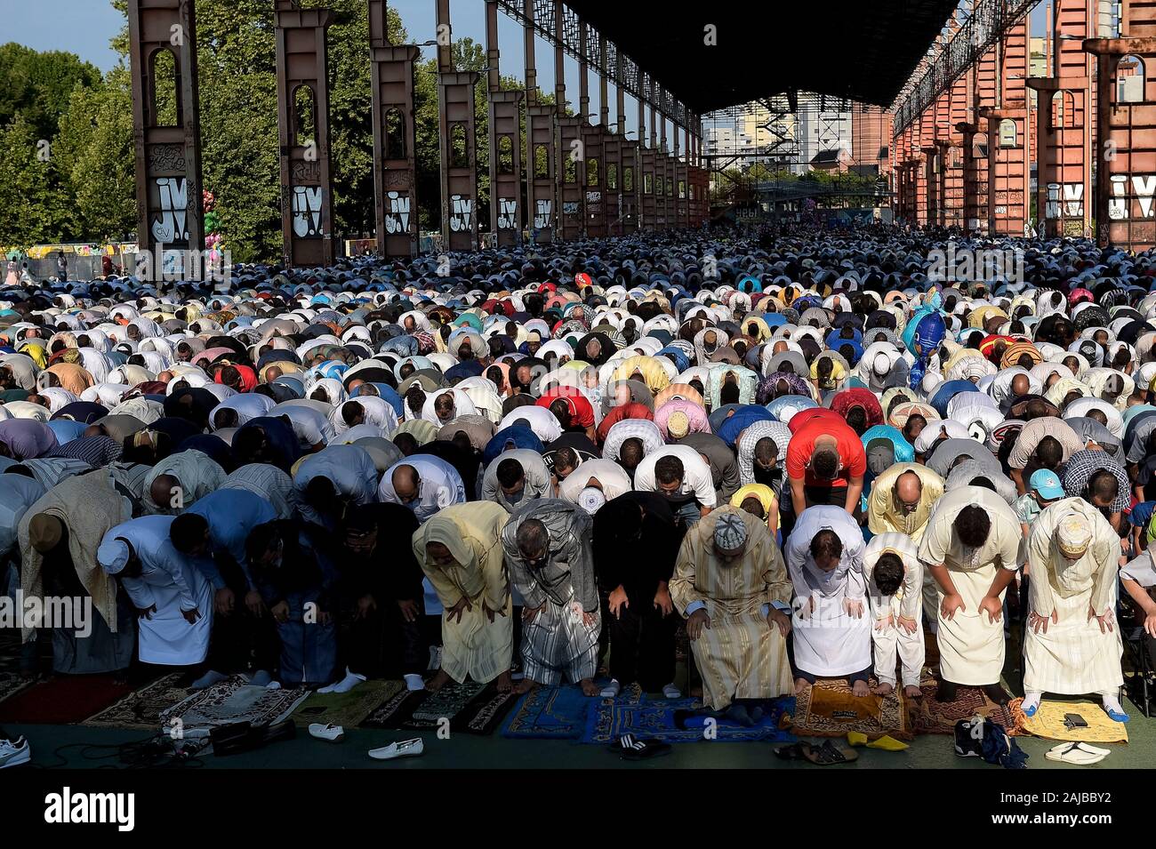 Turin, Italy - 21 August, 2018: Members of the Muslim community pray in ...