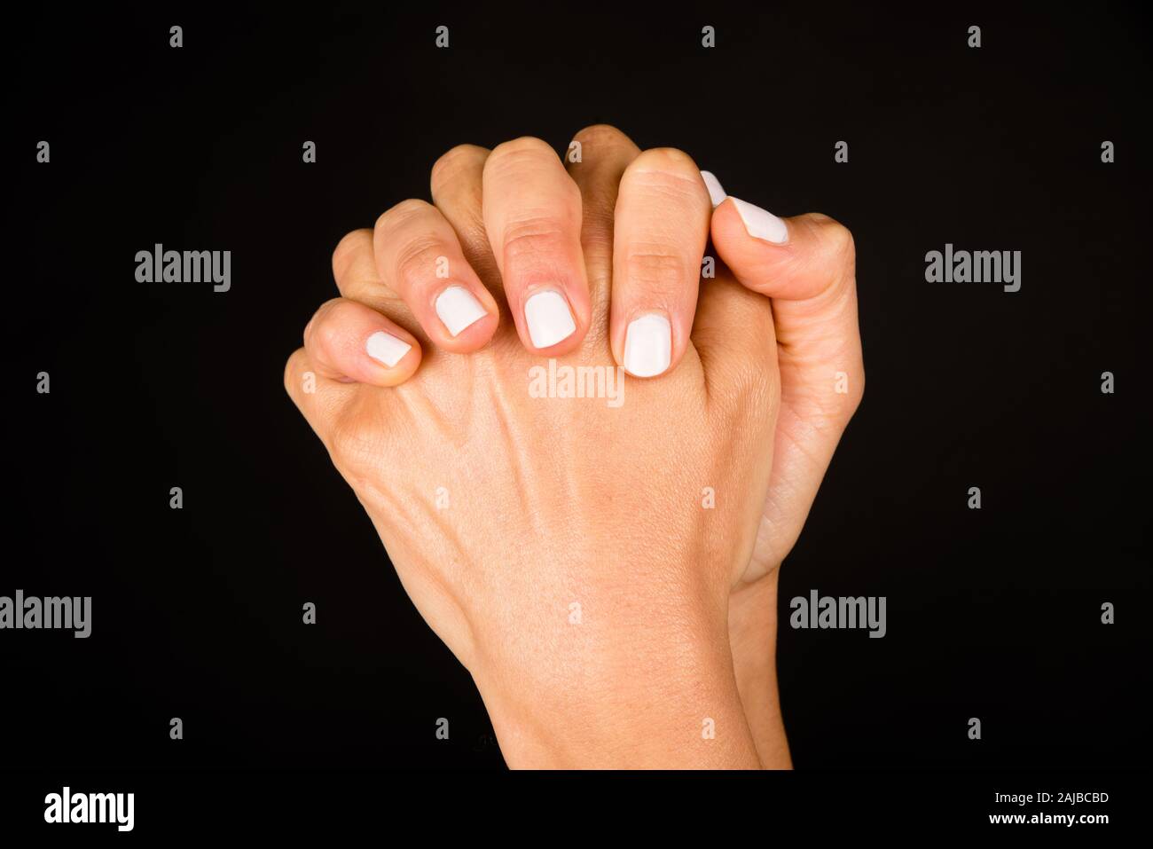 Female hands in a praying gesture, a concept Stock Photo - Alamy