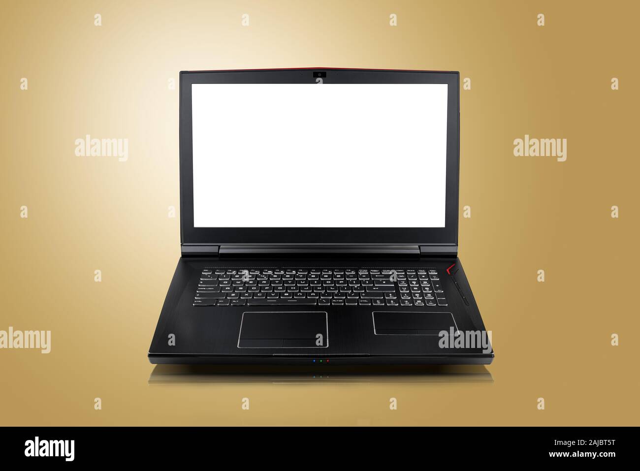 Front view of gaming laptop on golden yellow background. Laptop ...