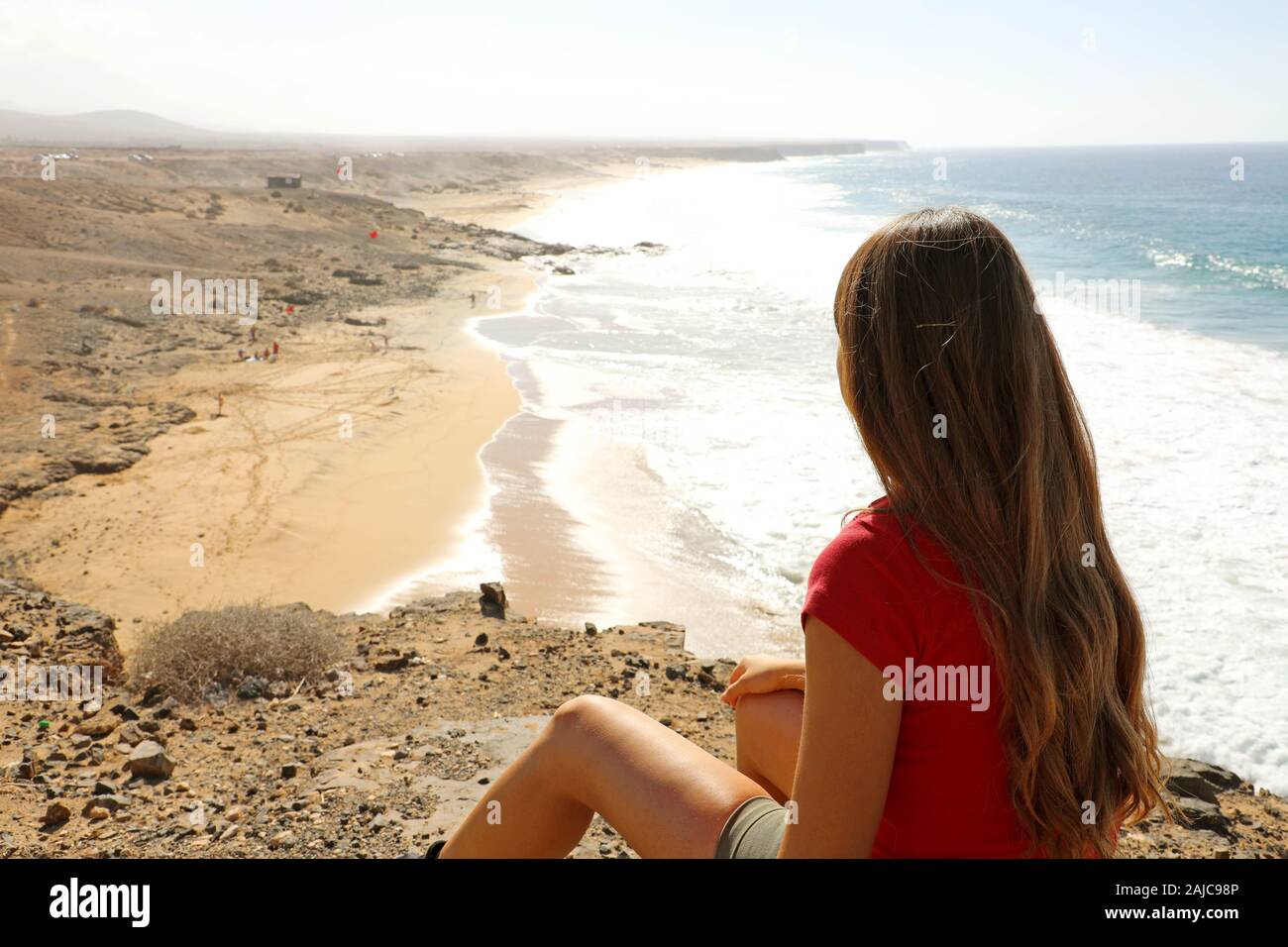 Calm, relax ,mind reset concept. Young woman sitting on top of the ...