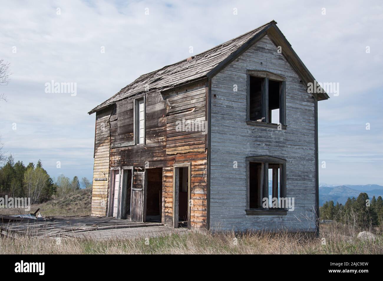 2 story old homestead ruins of a pioneer home falling apart. Old ...