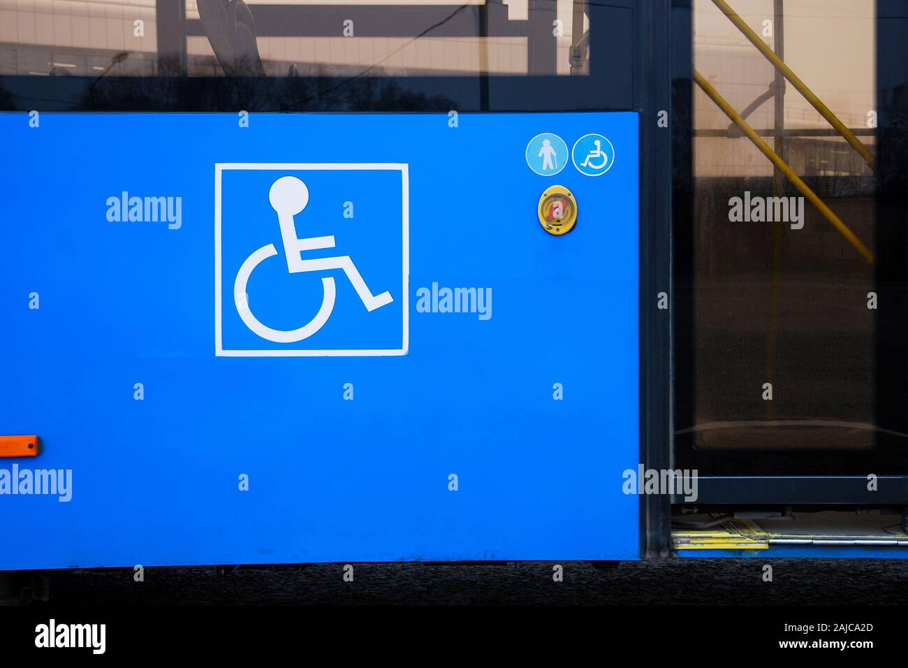 Disability and elderly person icon on public bus next to automatic ...