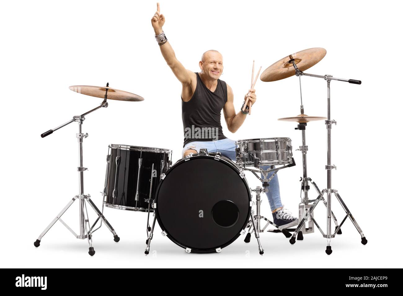 Male musician with a drum kit isolated on white background Stock Photo ...