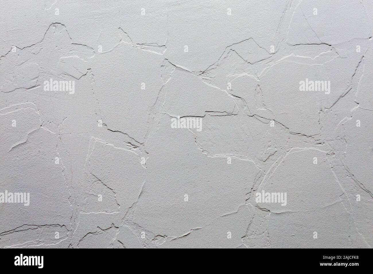 Abstract white unobtrusive background and texture. A plaster wall with ...