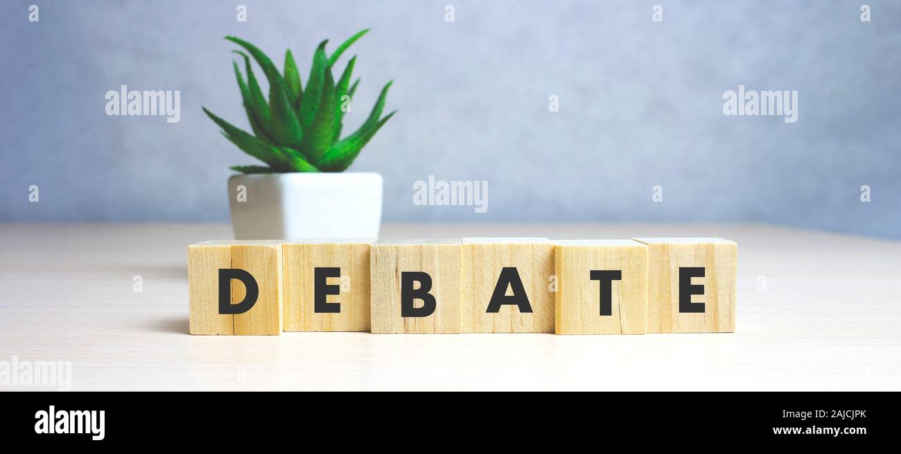 Wooden Blocks with the text: Debate concept Stock Photo - Alamy