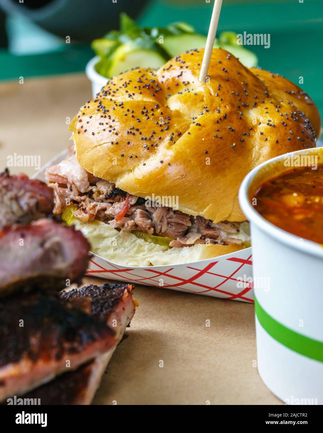 Close-up view of southern U.S. barbecue meal including ribs, pulled ...