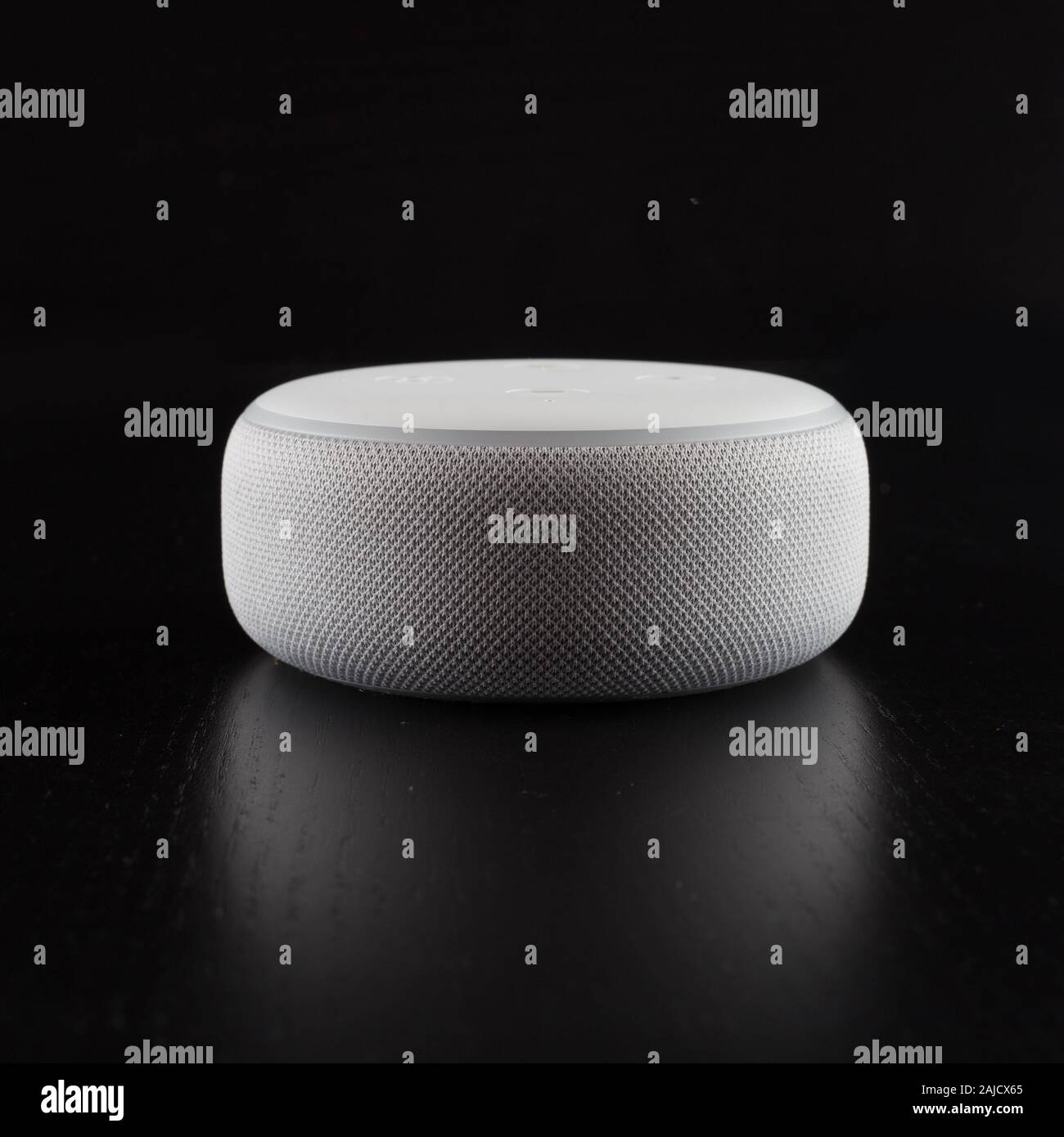 white digital voice assistant on a black background Stock Photo - Alamy