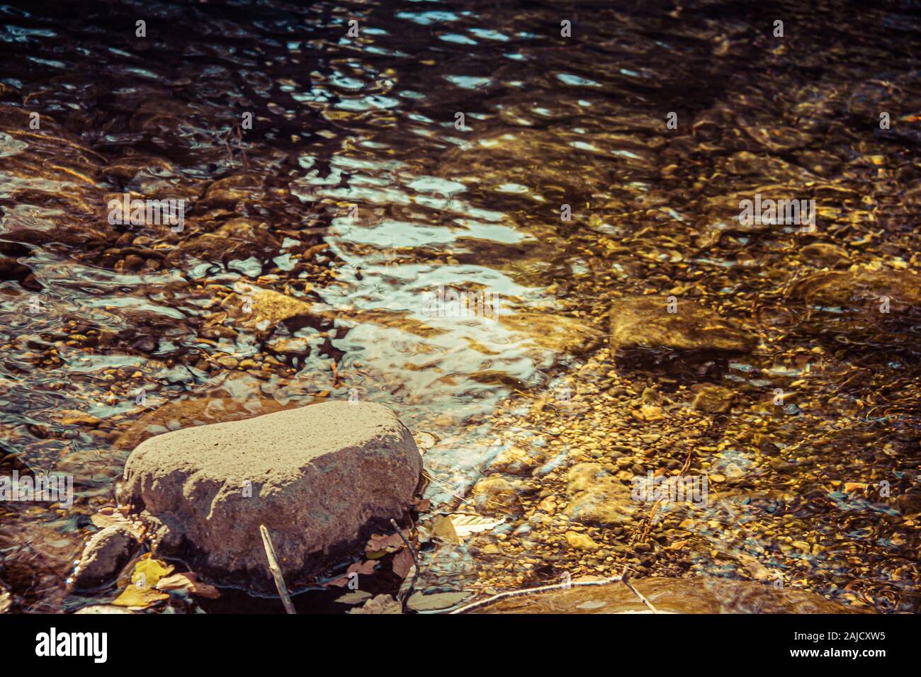 Calm water around rocks hi-res stock photography and images - Alamy