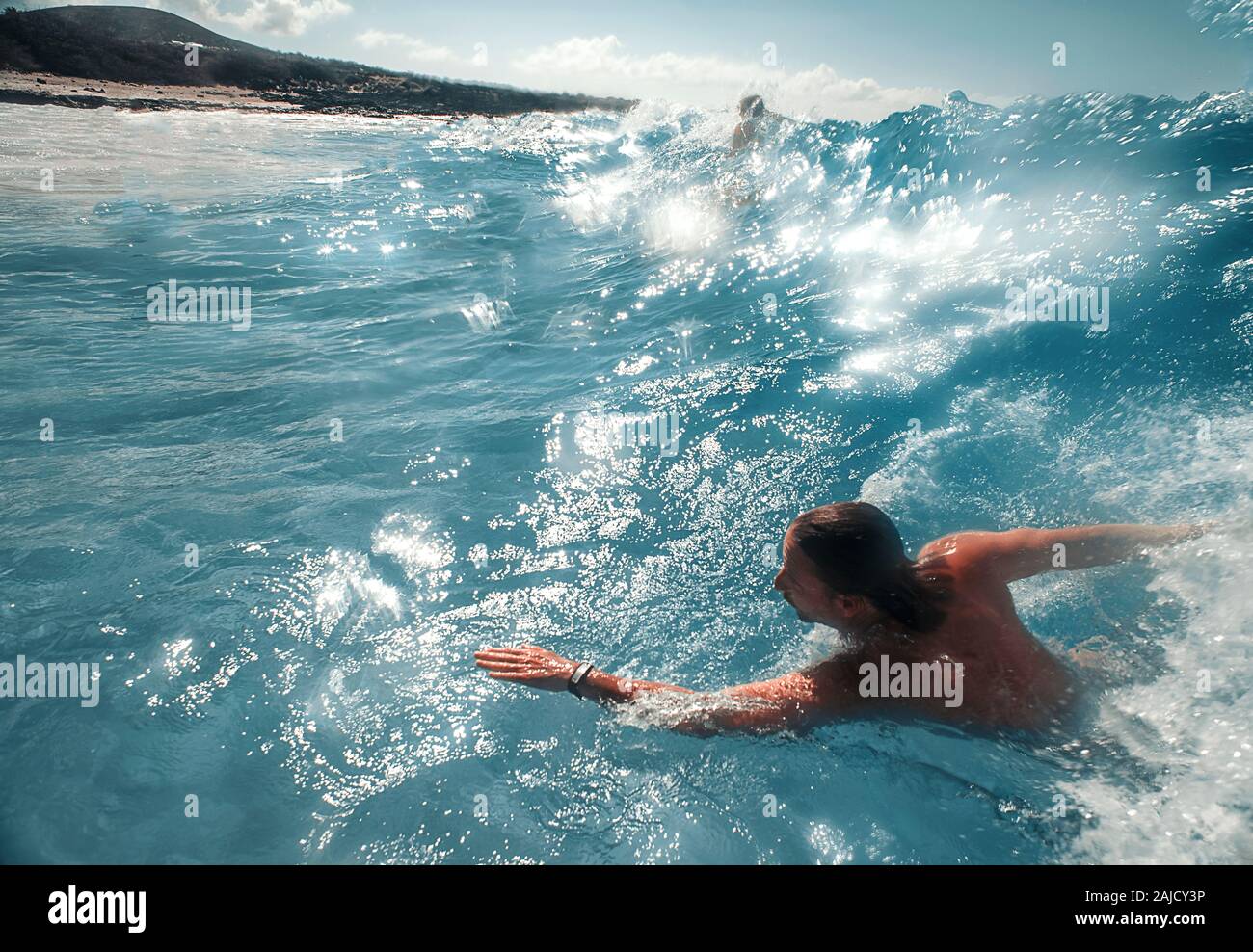 Swimmer in the surf hi-res stock photography and images - Alamy