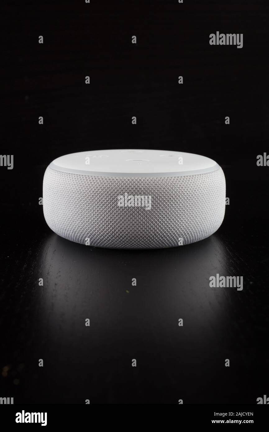 white digital voice assistant on a black background Stock Photo - Alamy