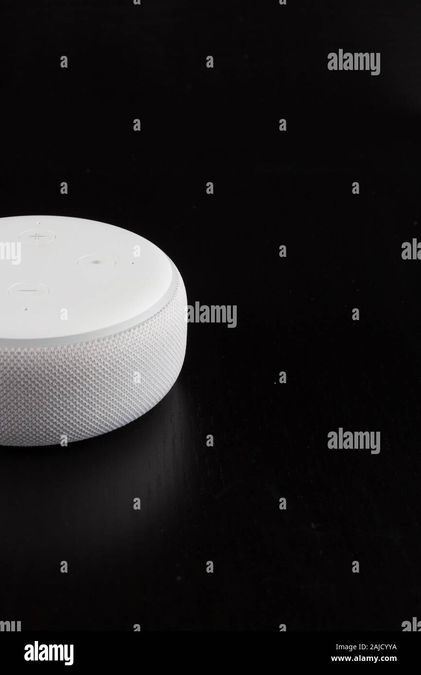 white digital voice assistant on a black background Stock Photo - Alamy