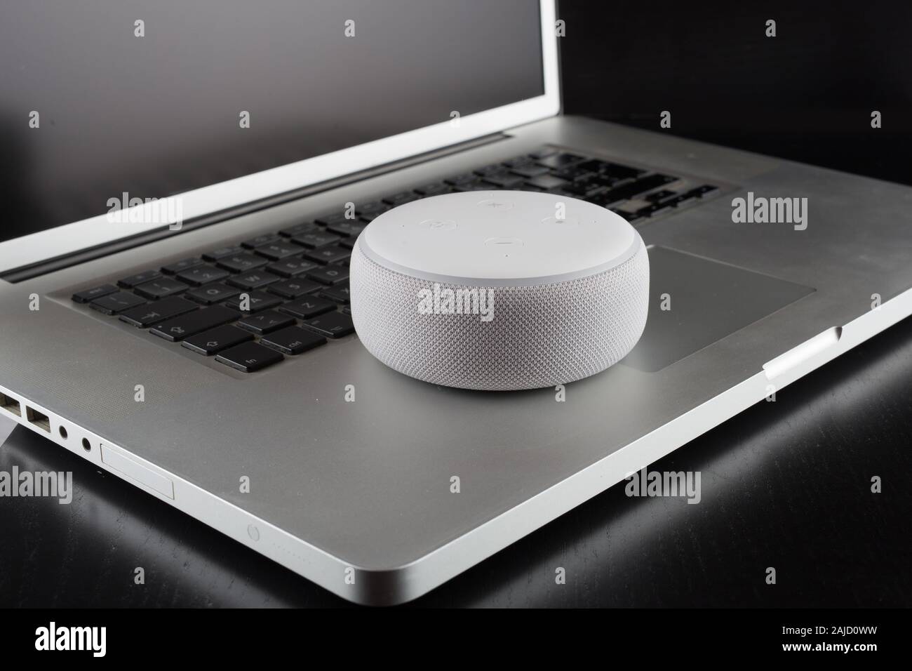 white digital voice assistant with computer on a black background Stock ...