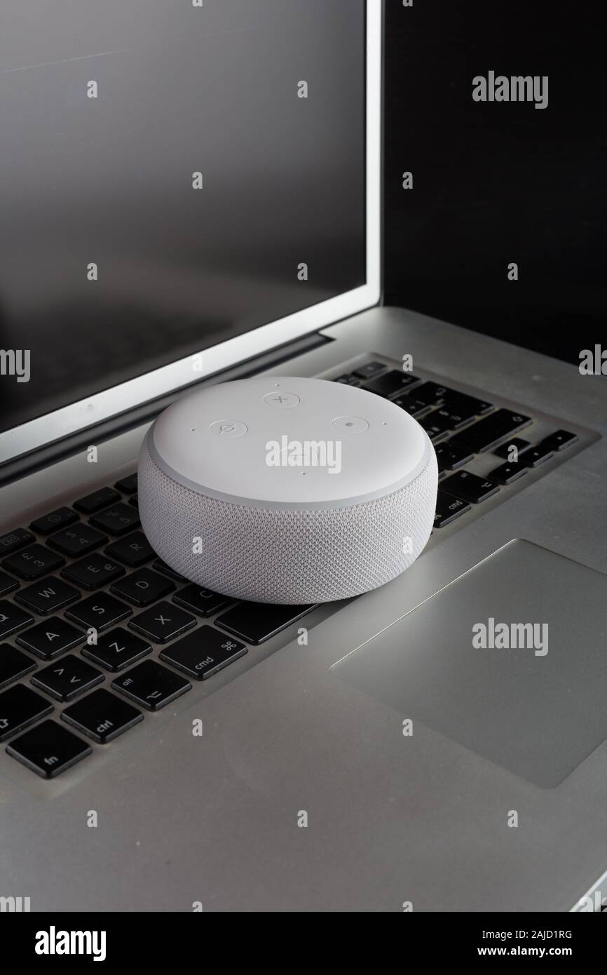 white digital voice assistant with computer on a black background Stock ...