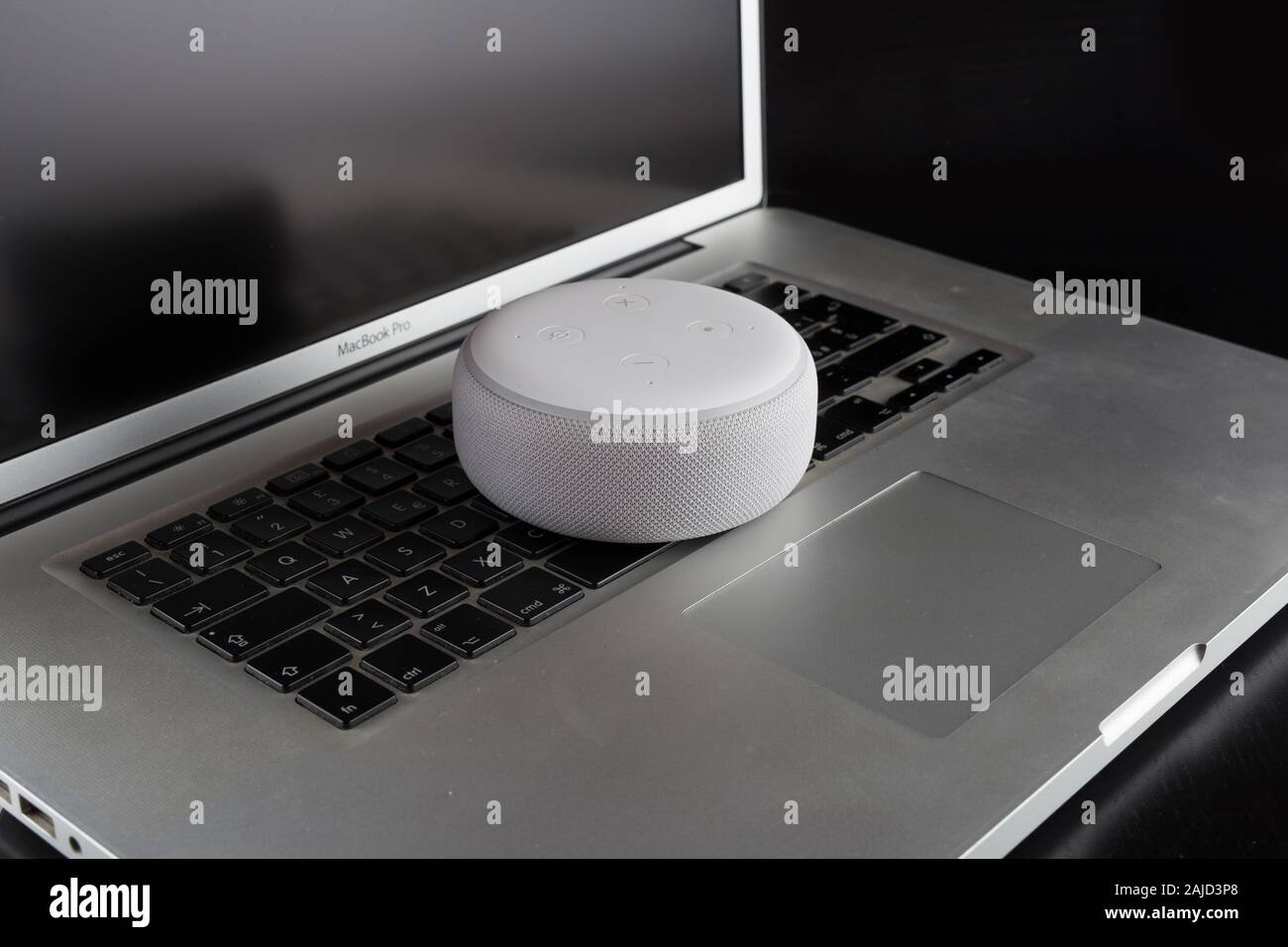 white digital voice assistant with computer on a black background Stock ...