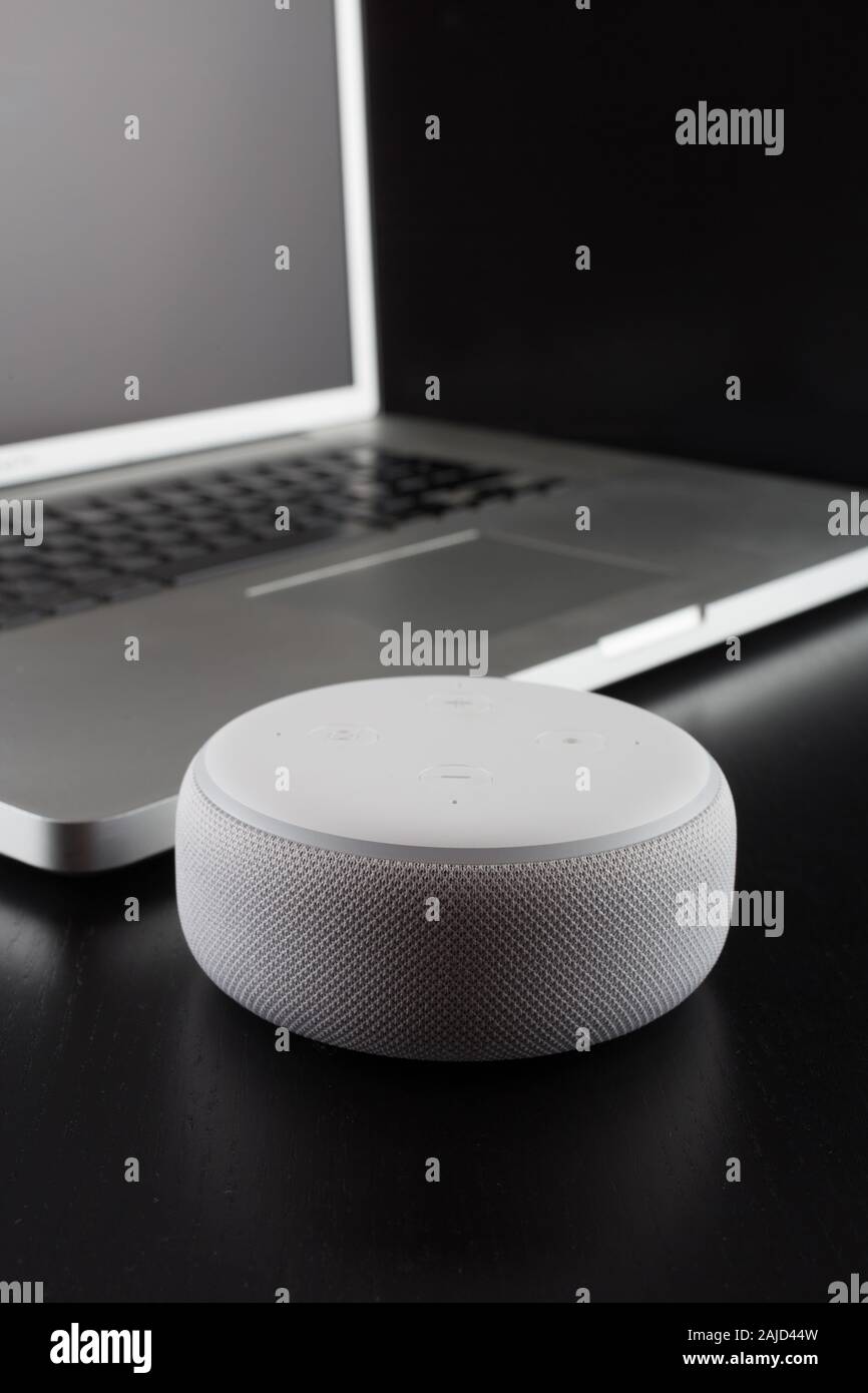 white digital voice assistant with computer on a black background Stock ...