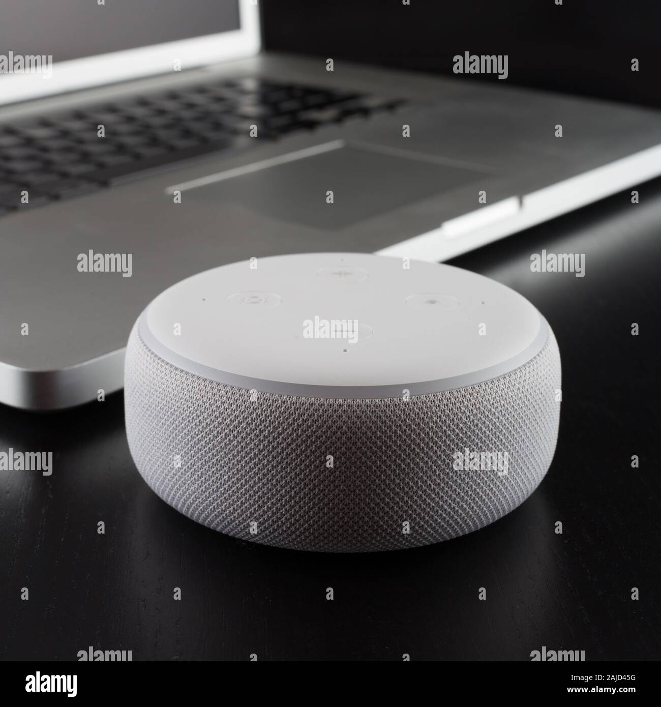 white digital voice assistant with computer on a black background Stock ...