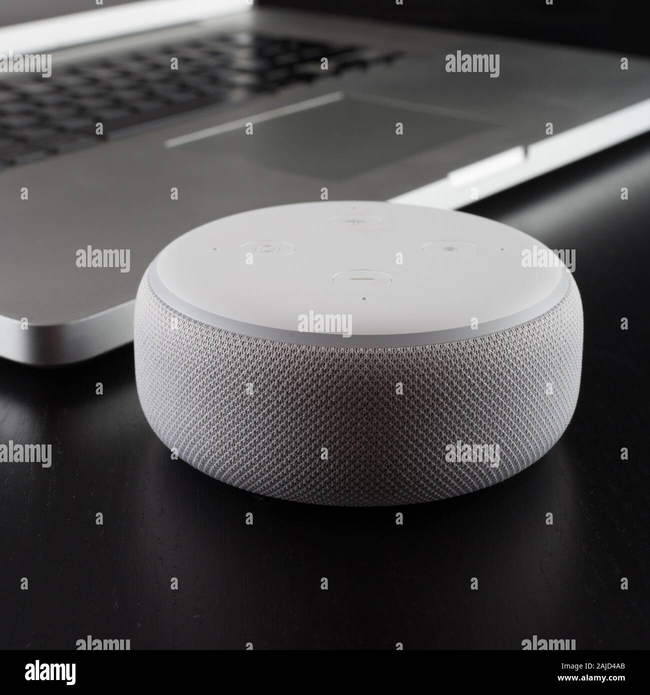 white digital voice assistant with computer on a black background Stock ...