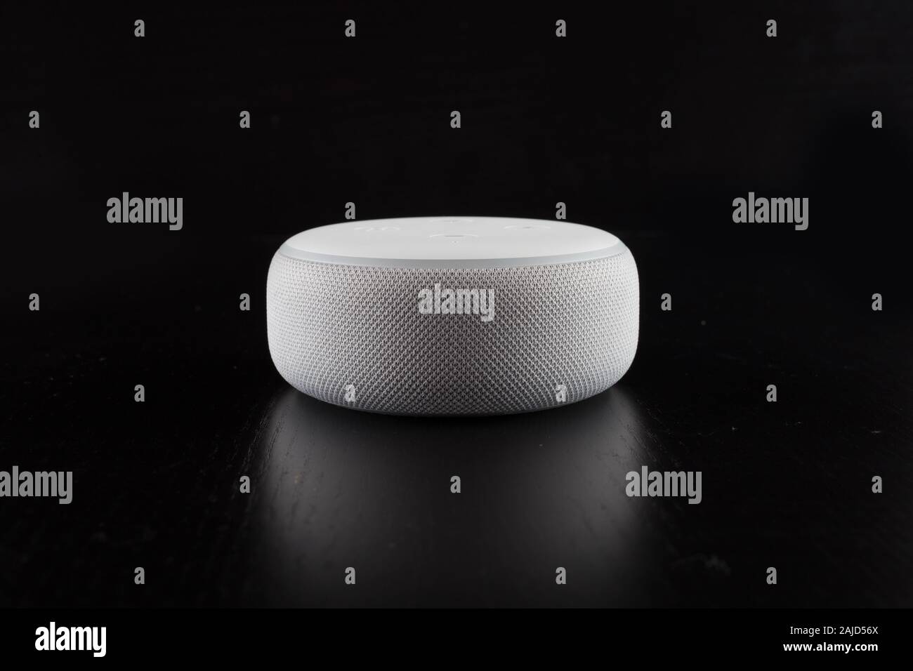 white digital voice assistant on a black background Stock Photo - Alamy