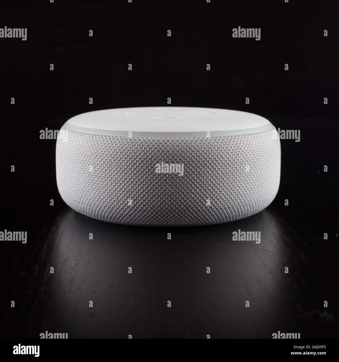 white digital voice assistant on a black background Stock Photo - Alamy