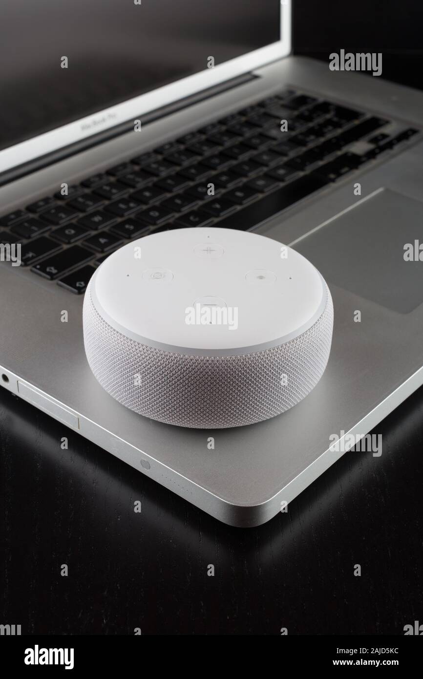 white digital voice assistant with computer on a black background Stock ...