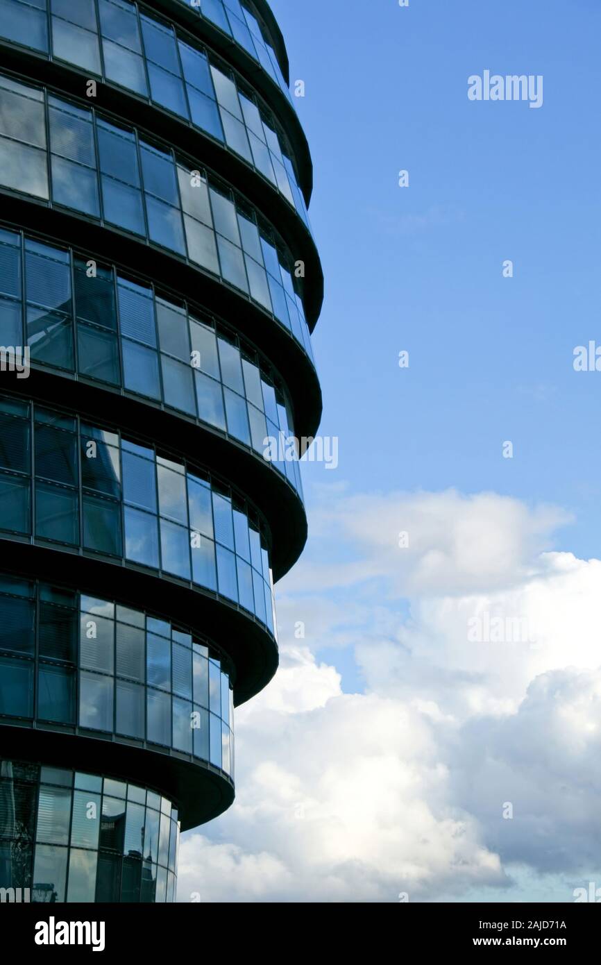 Unusual oval glass building in step construction Stock Photo - Alamy