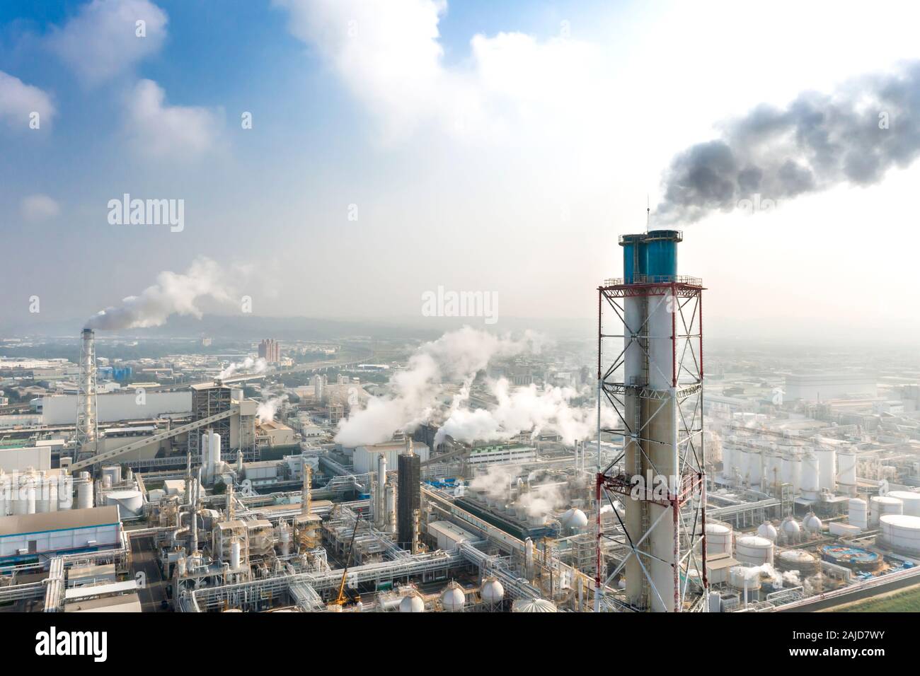 Aerial view of industrial area with chemical plant. Smoking chimney ...