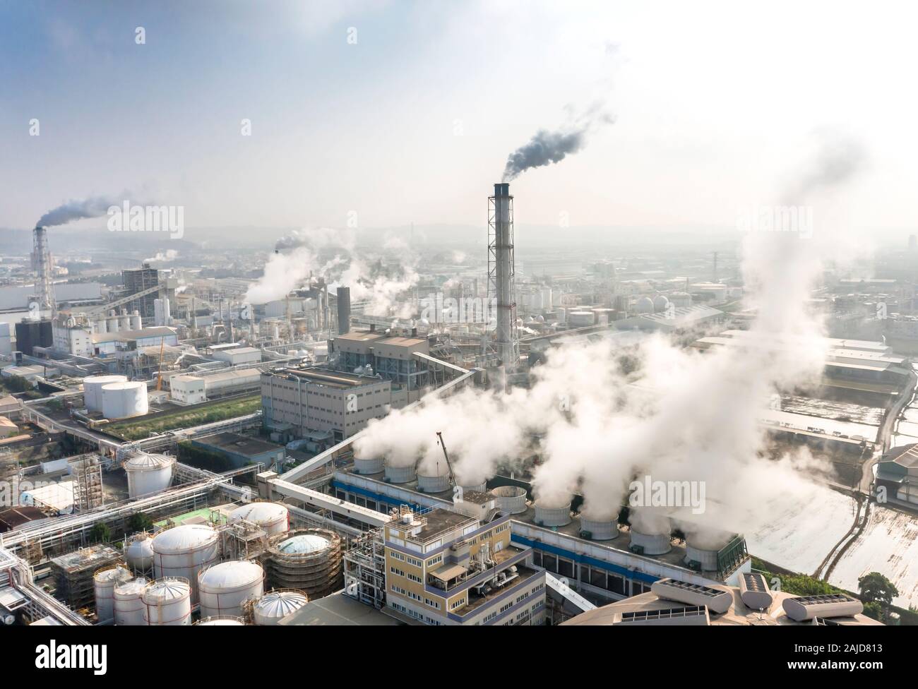 Aerial view of industrial area with chemical plant. Smoking chimney ...