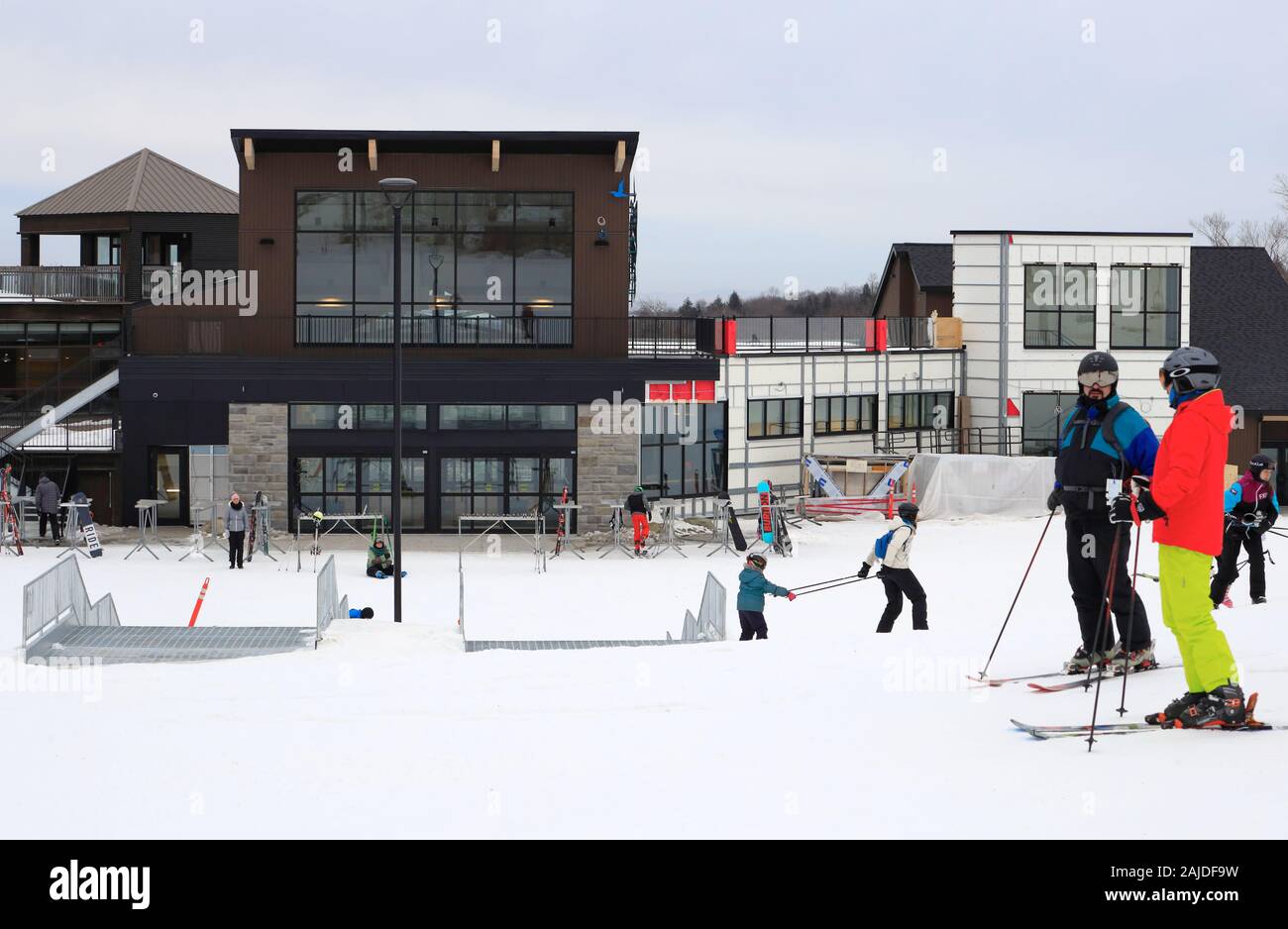 skiers outside of the main building of Mont-Orford ski resort. Mont ...