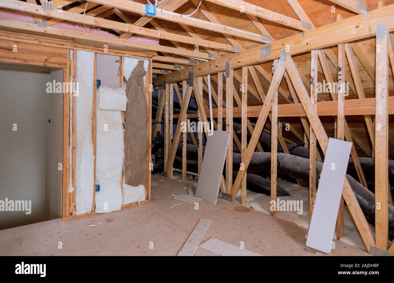 Ventilation pipes insulation material on the attic inside unfinished ...