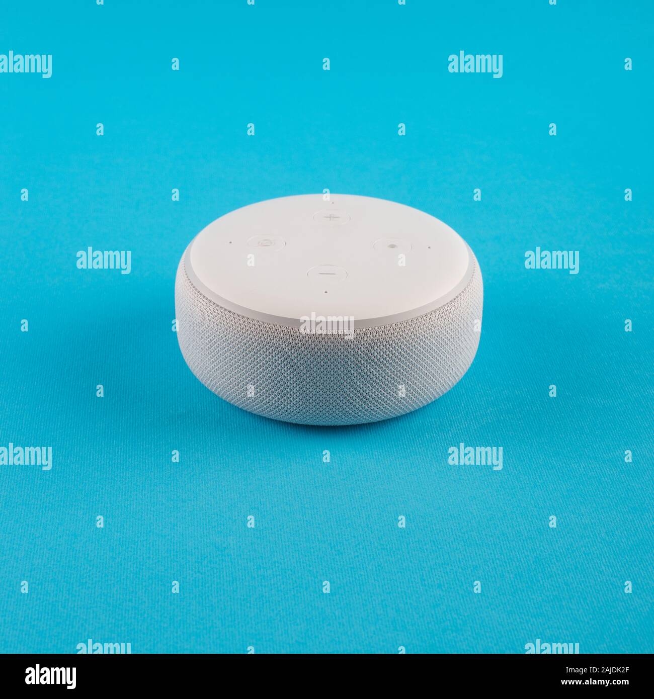 white digital voice assistant on light blue background Stock Photo - Alamy